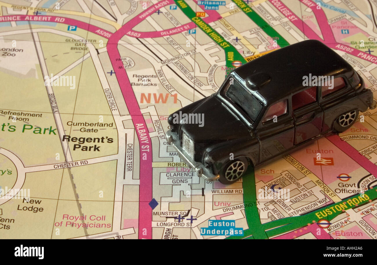 Taxi Cab on Map Stock Photo - Alamy