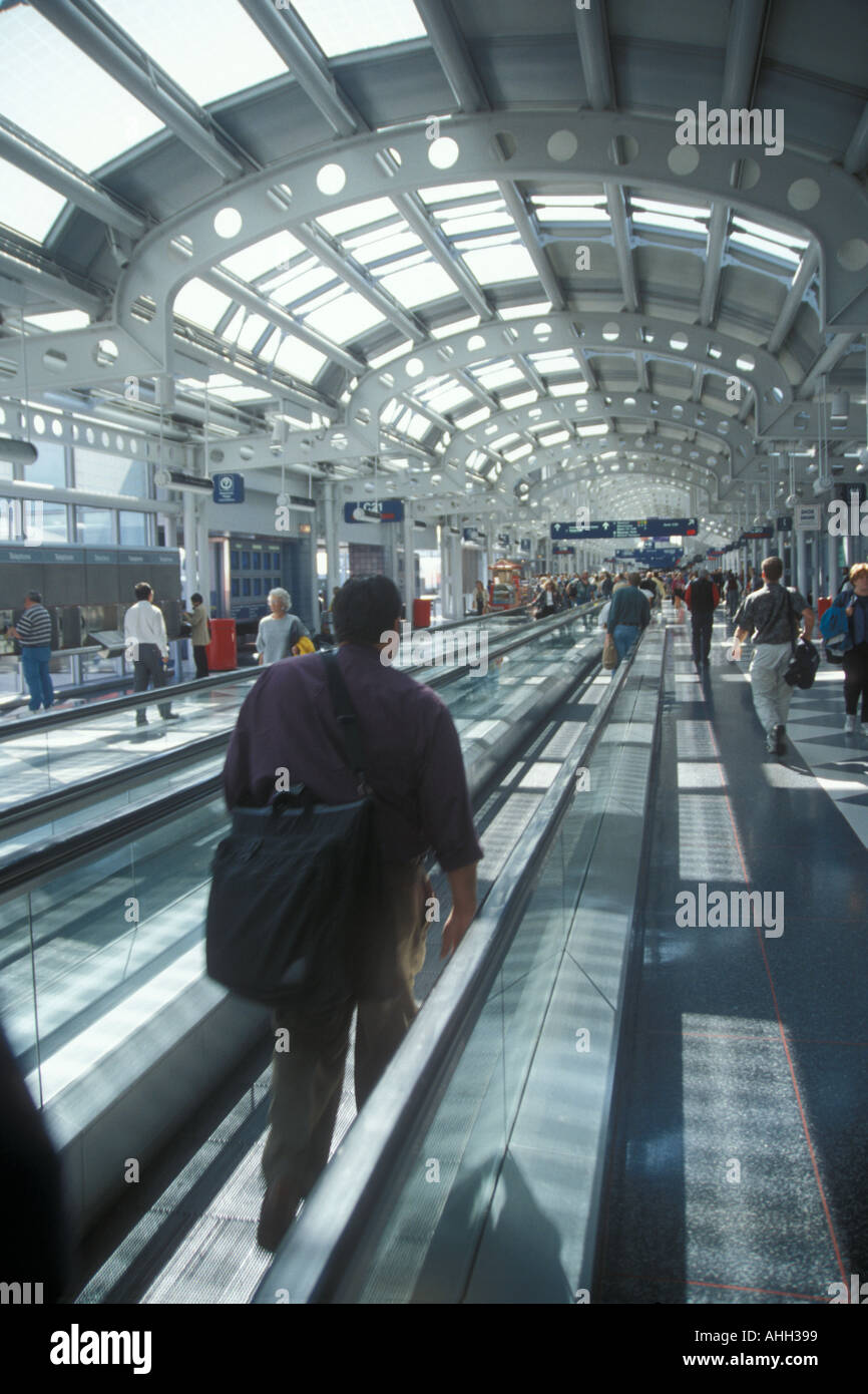 Man walking on Movable Walkway Stock Photo - Alamy