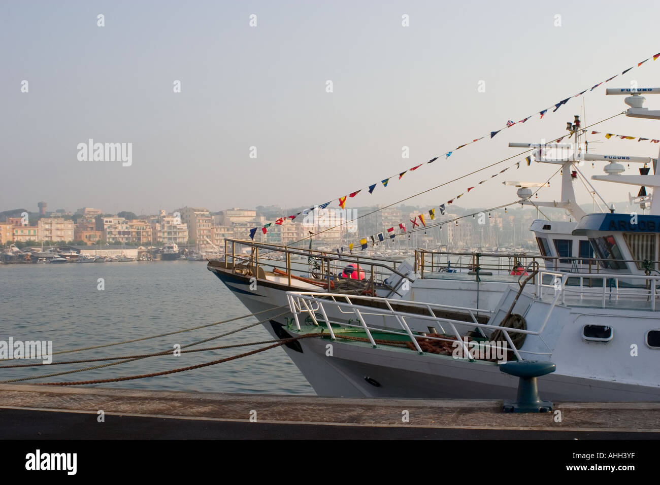 Sailing ship dressed overall with their signal flags in Anzio, Italy ...