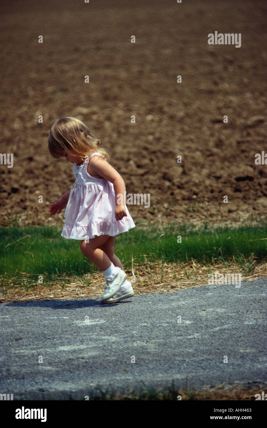 Little Girl Running Stock Photo - Alamy