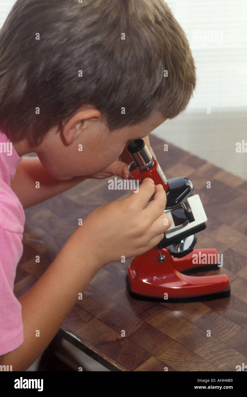 Look through microscope hi-res stock photography and images - Alamy