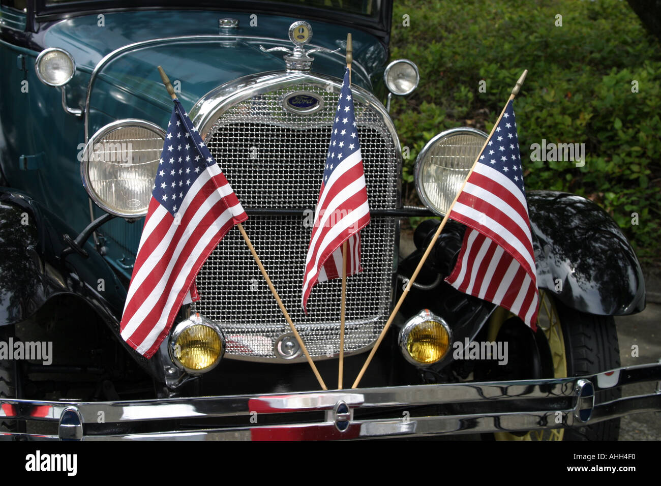 American flags on model T Ford Stock Photo - Alamy