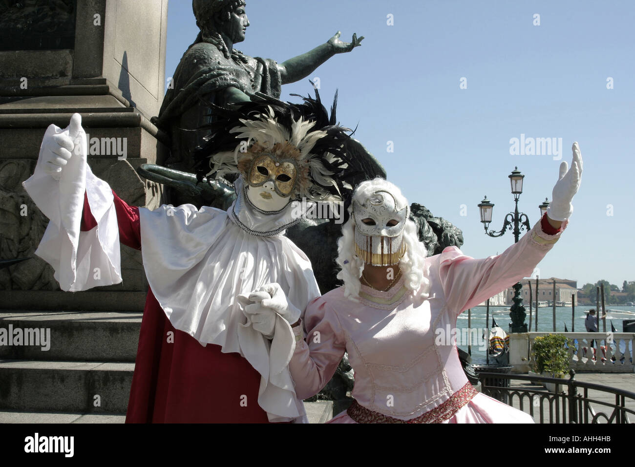 Two human statues in Venice, Italy with the real thing behind Stock ...