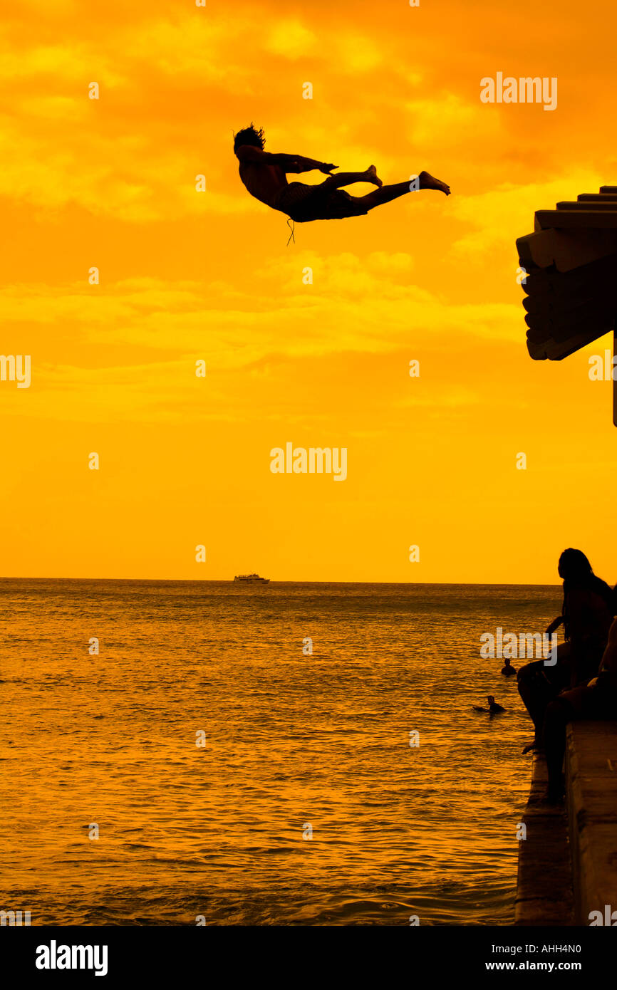 Silhouette of a Man Diving Stock Photo - Alamy