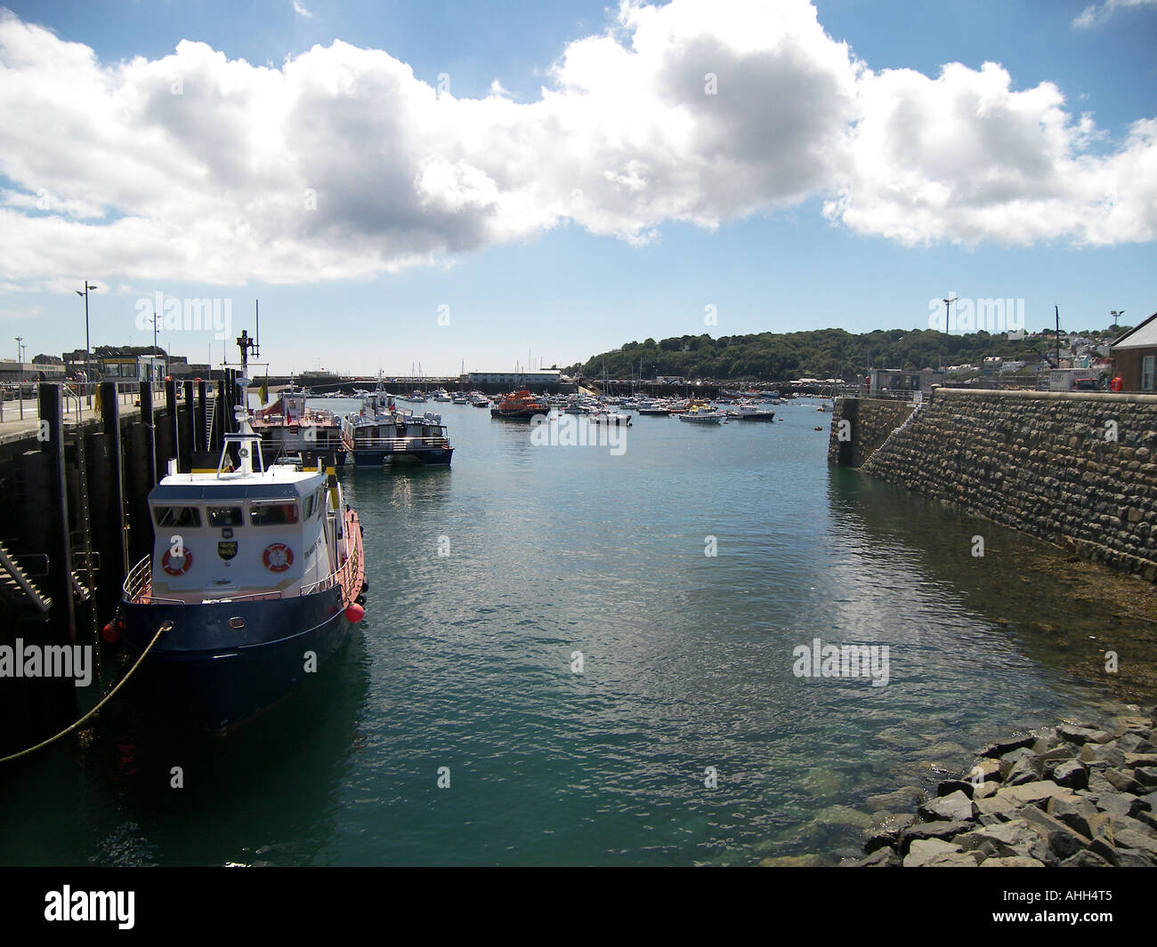 Boats in Guernsey Harbour Stock Photo - Alamy