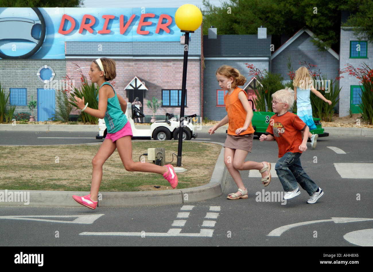 Driving lessons for children. Kids learning the rules of the road using ...