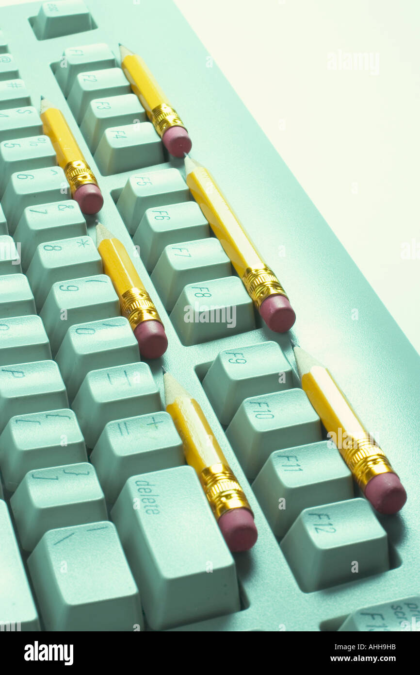 Short Pencils on Computer Keyboard Stock Photo - Alamy