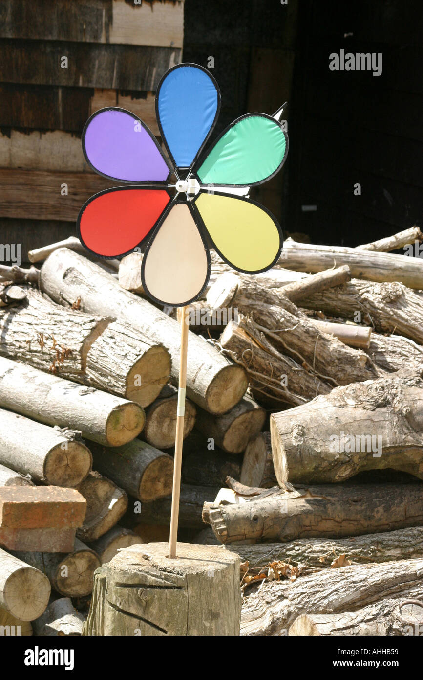 A brightly coloured child s toy windmill Stock Photo - Alamy