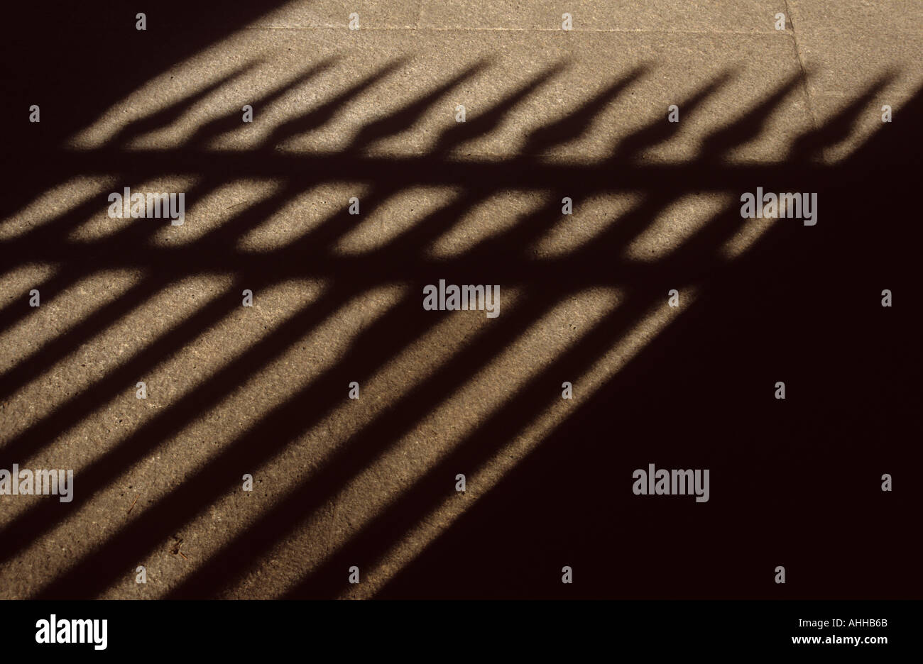 Shadow of a gate Stock Photo - Alamy