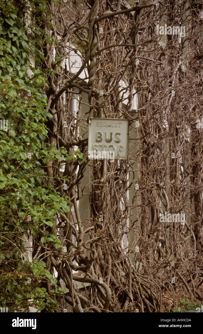 Old fashioned English bus stop sign in the village of Dedham Essex UK ...