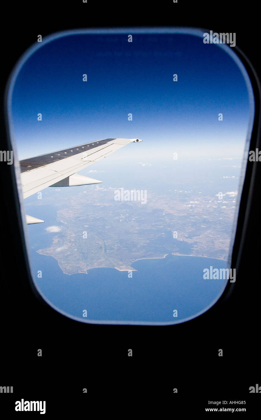 Plane wing from inside Stock Photo - Alamy