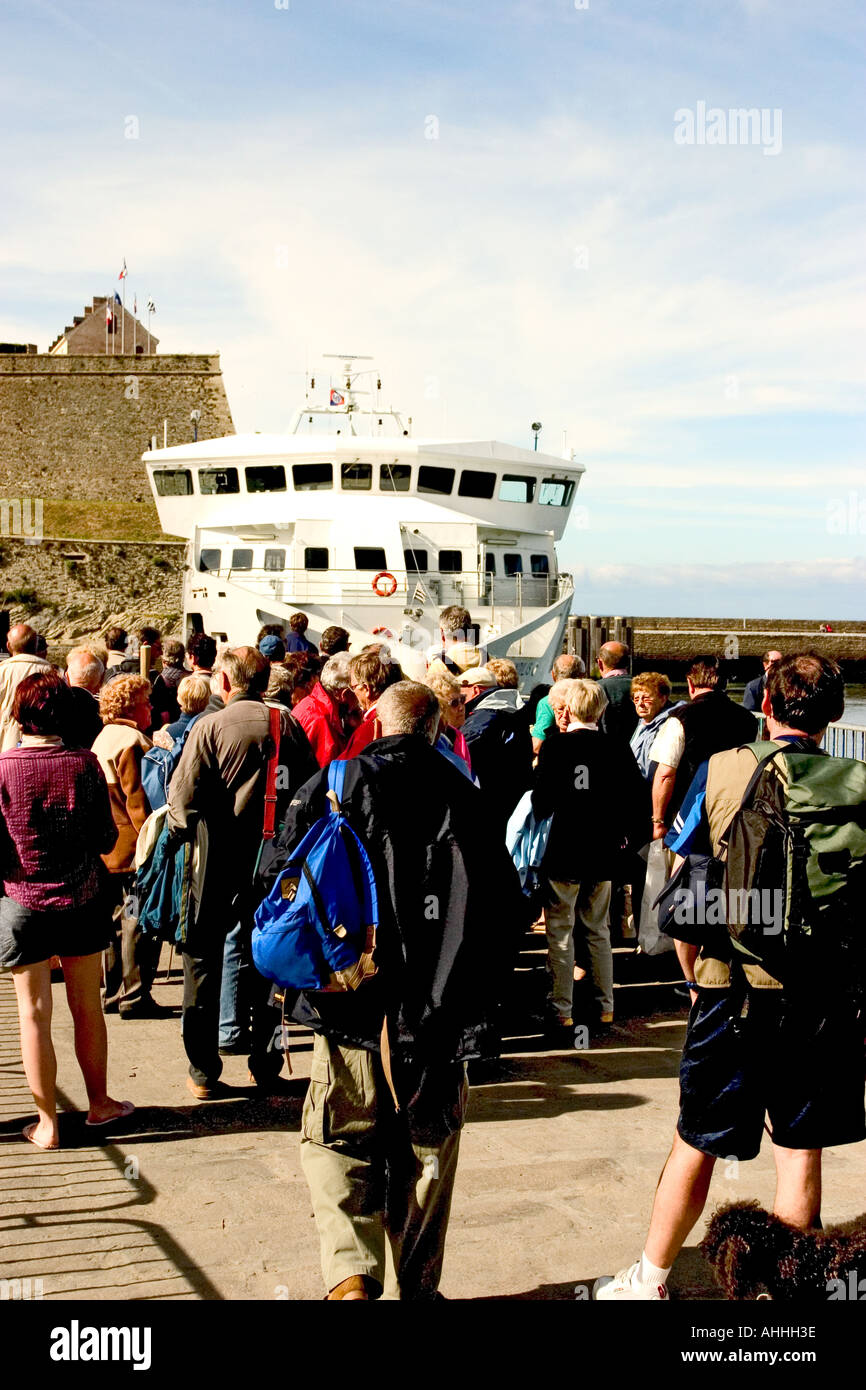 line up of people waiting to boarding on the boat in le palais belle ...