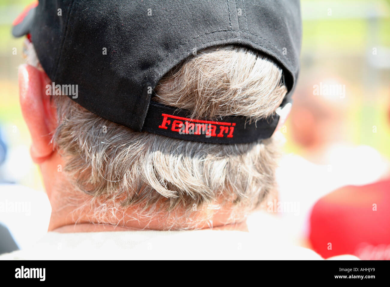 Middle aged man wearing Ferrari cap at 2006 British Grand Prix ...