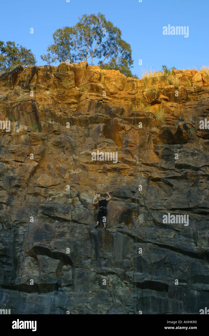 Woman rock climbing in Brisbane the capital of Queensland Australia pop ...