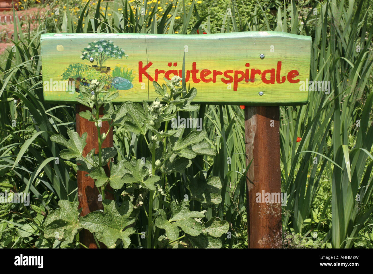 sign in a natural garden Stock Photo - Alamy