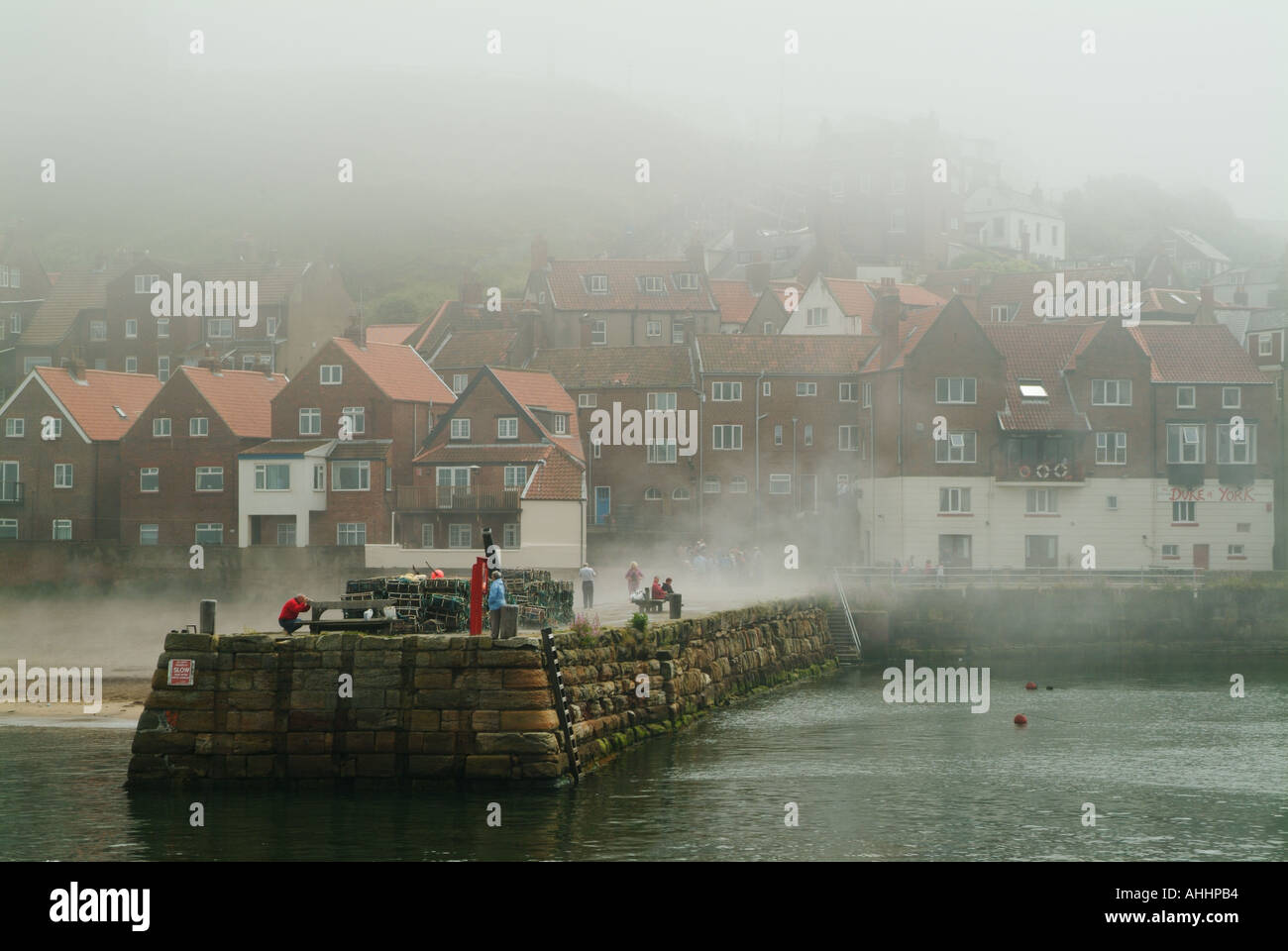 Whitby port in a sea mist sea flett in the summer North Yorkshire ...
