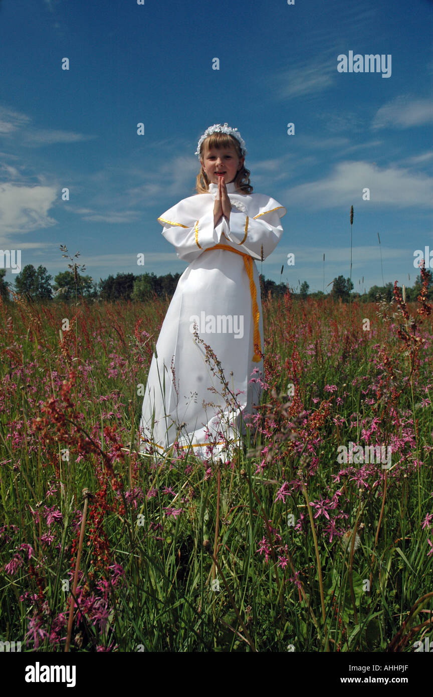 Nine years old polish girl in traditional white dress after her first ...
