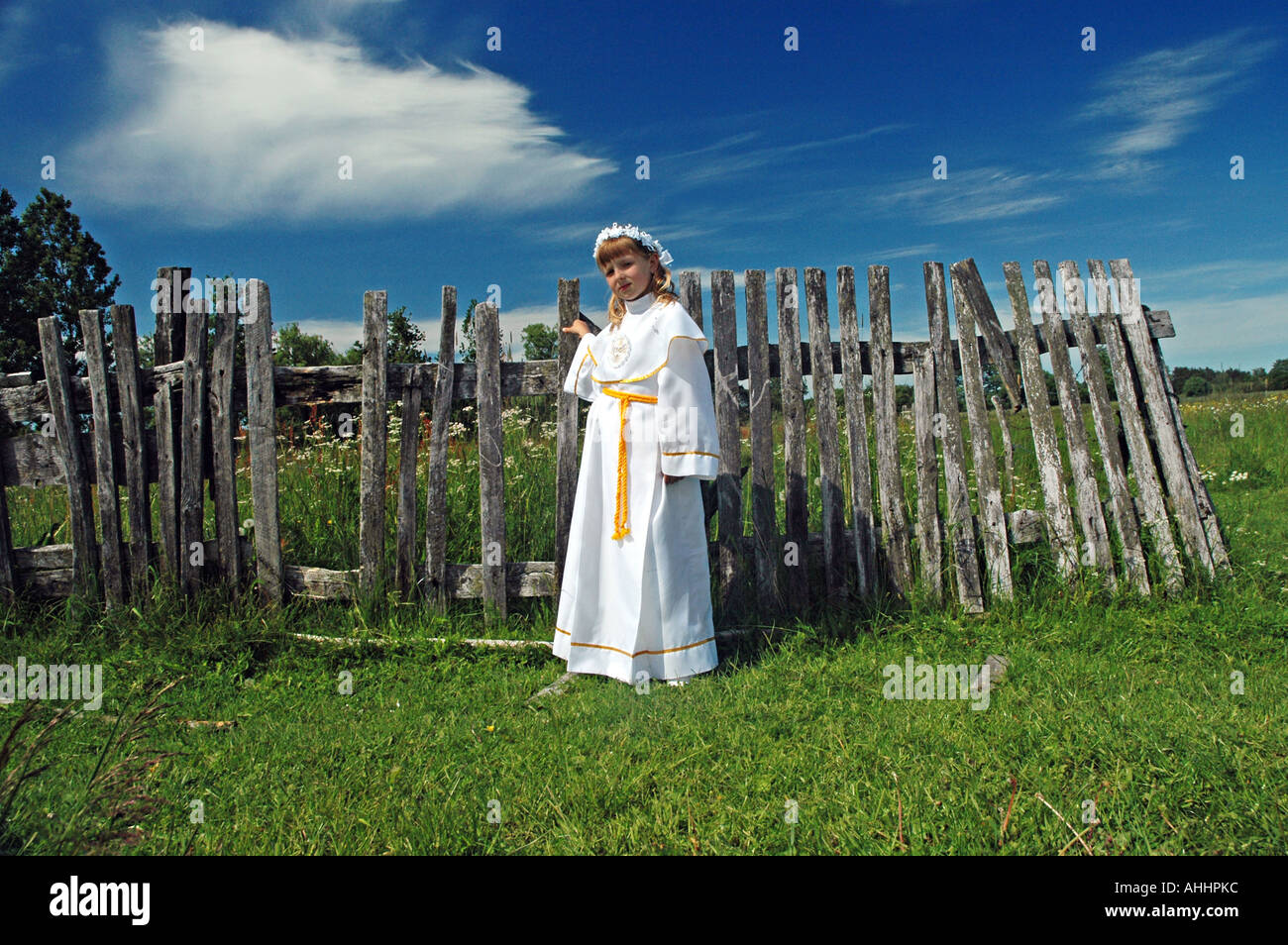 Nine years old polish girl in traditional white dress after her first ...