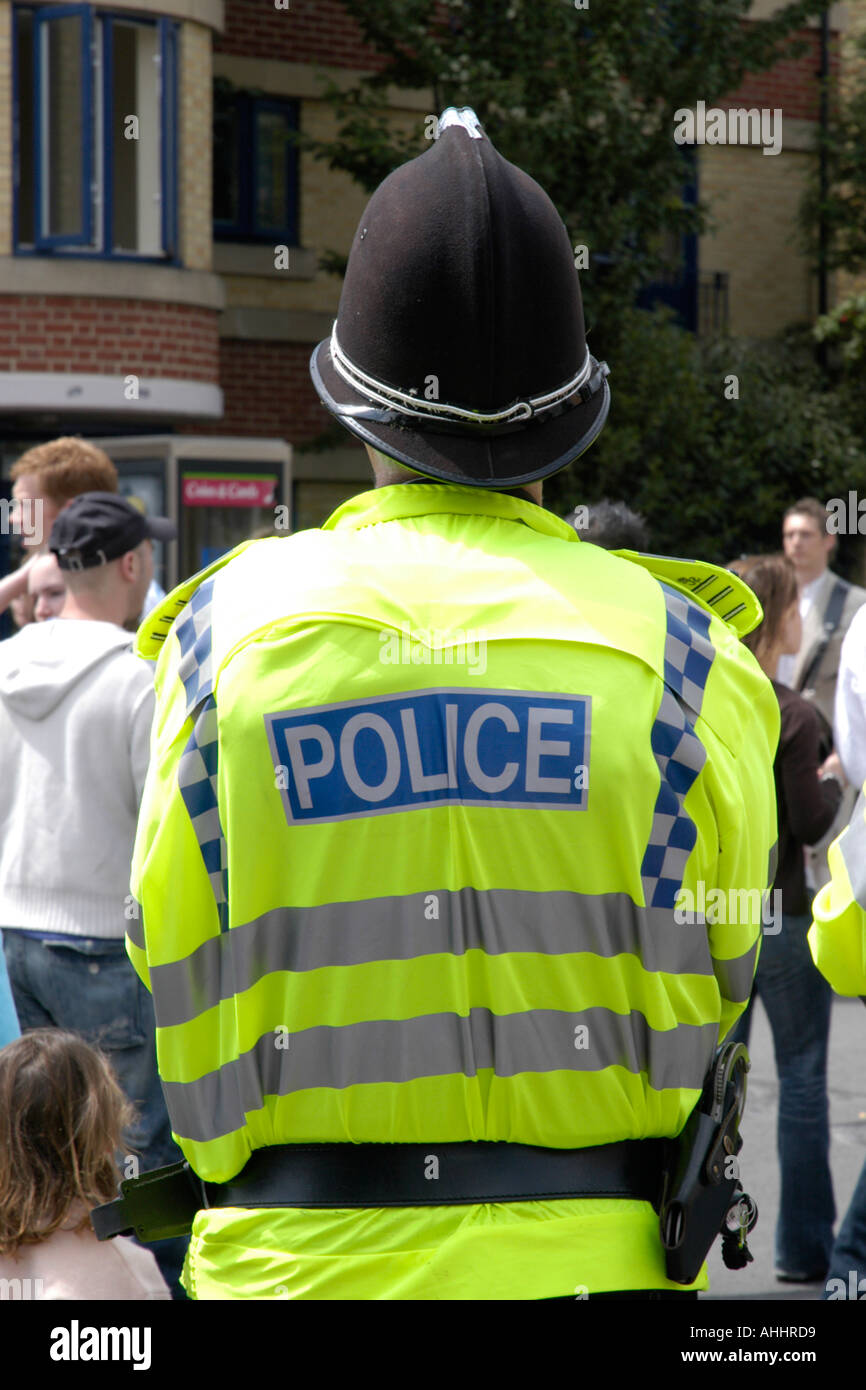 Rear view of Policeman Stock Photo - Alamy