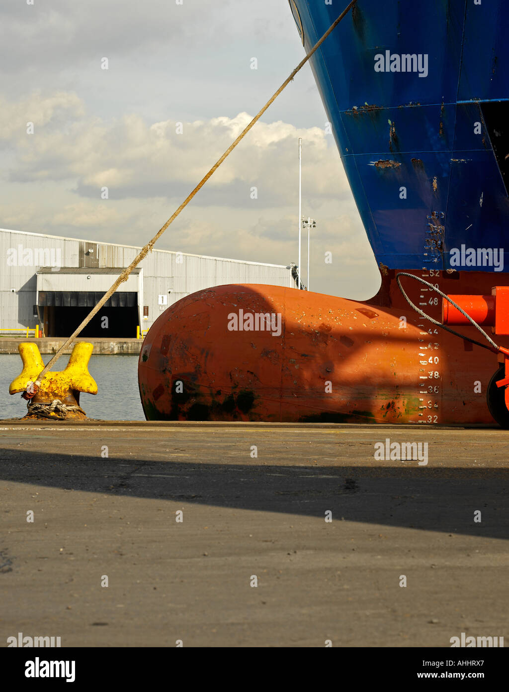 shipping and logistics forward nose of docked container ship with ...