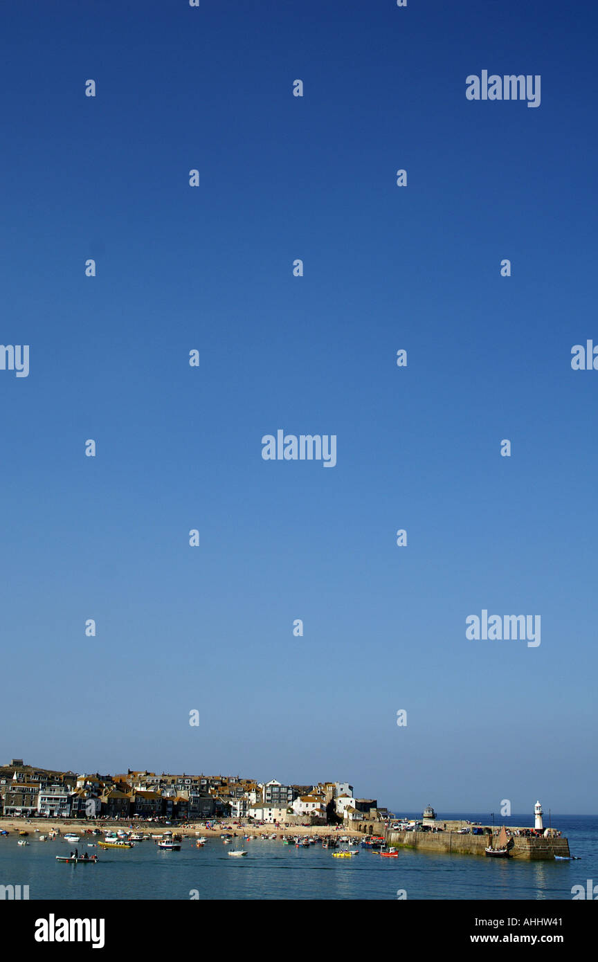The blue sky blue skies harbour and beach St Ives St Ives head Cornwall ...