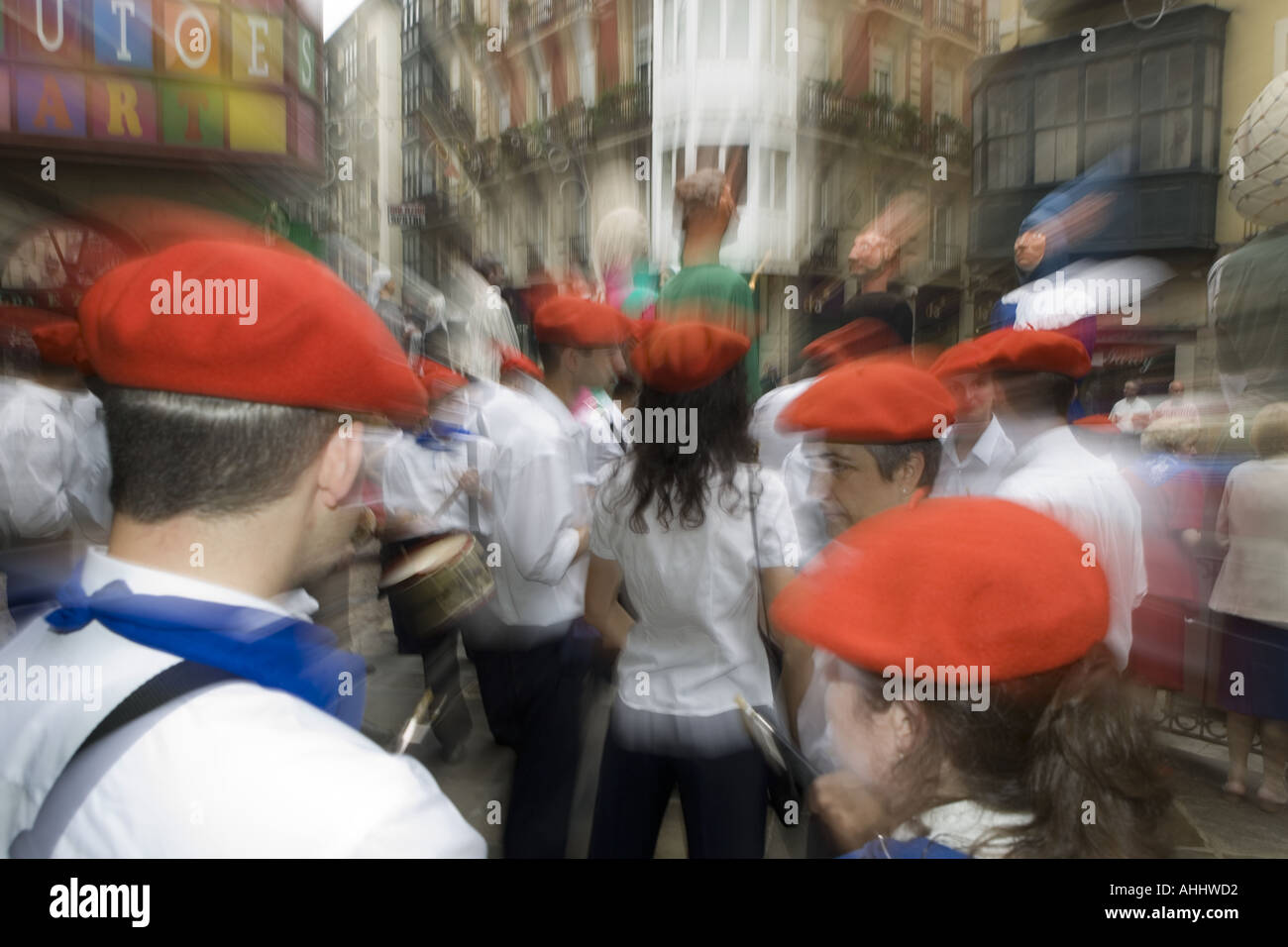 Member of a traditional Basque band wearing red berets parade in Bilbao ...