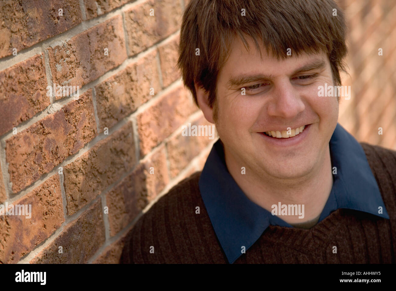 Single Man Smiling Stock Photo - Alamy