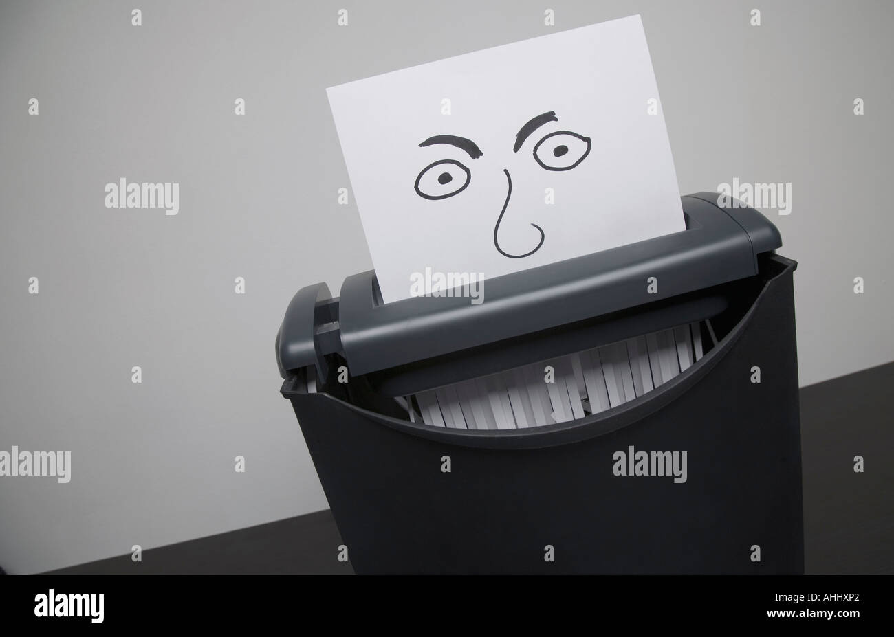 Paper being shred Stock Photo - Alamy