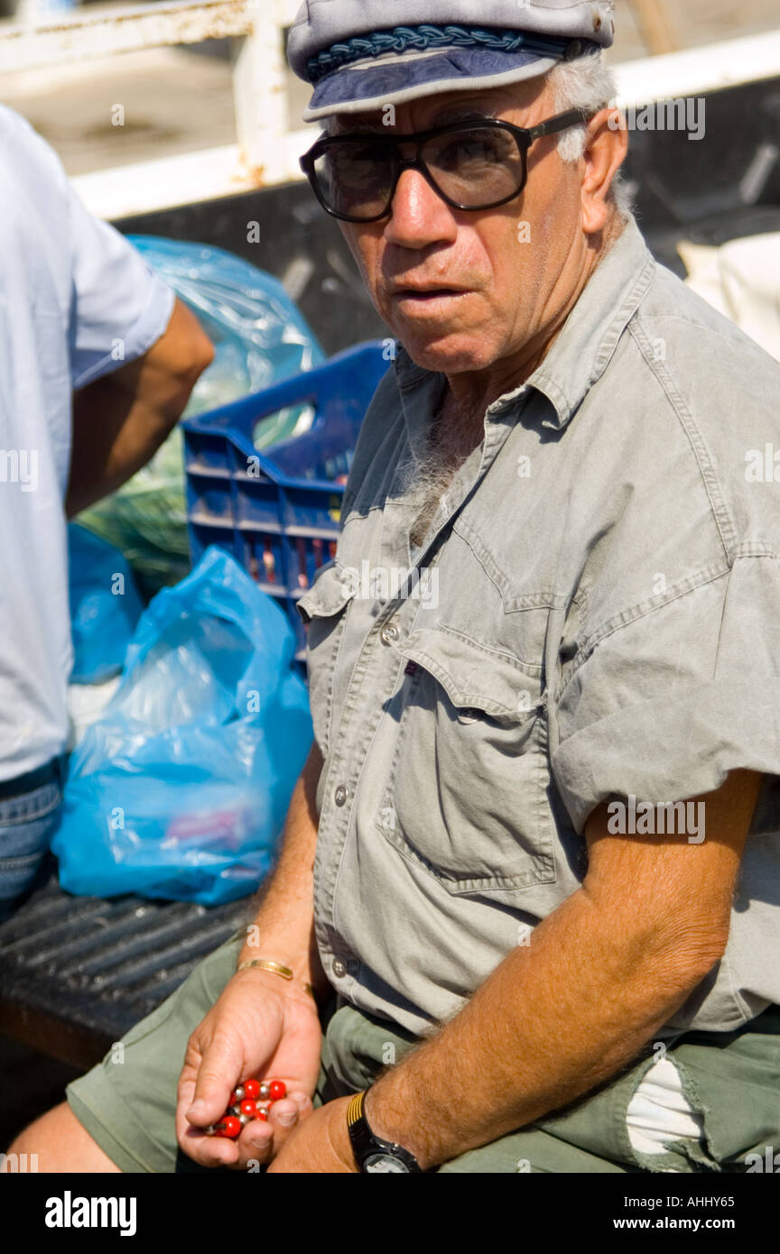 Local greek man in the market Mykonos Town Mykonos The Cyclades Greek ...