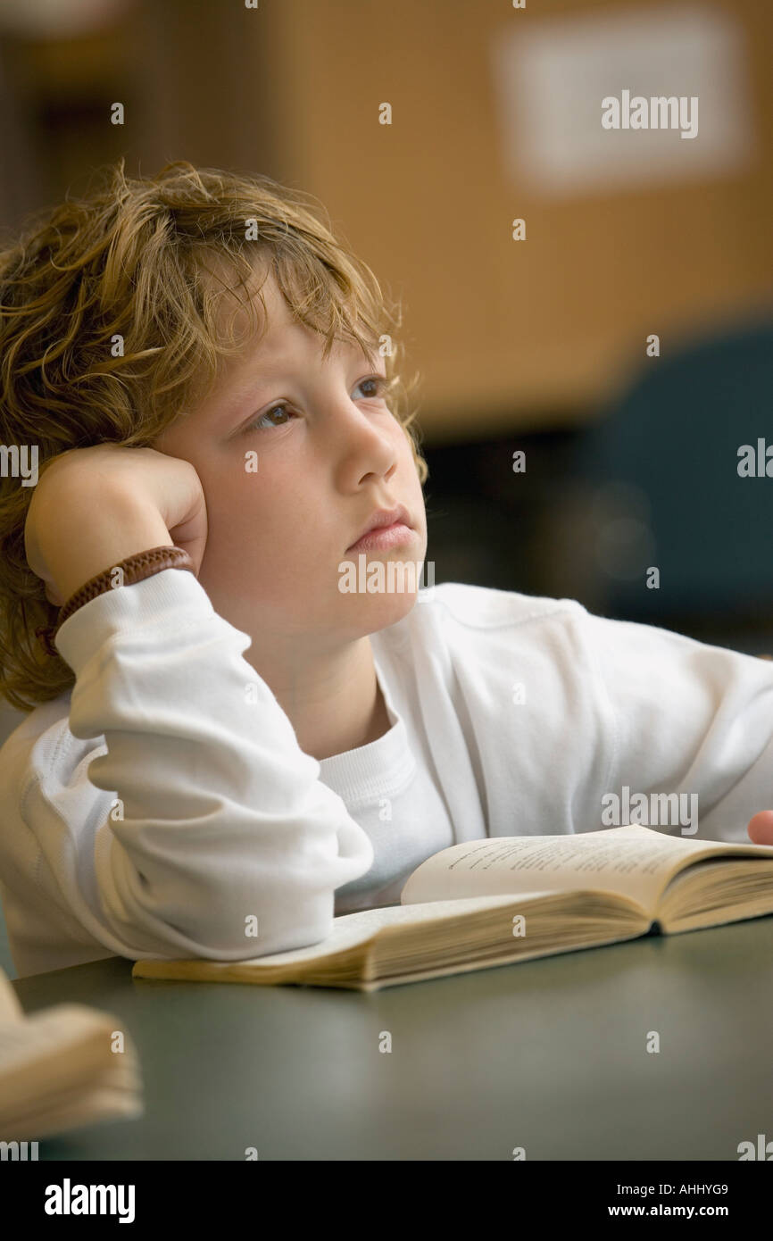 Child pondering 11 years hi-res stock photography and images - Alamy