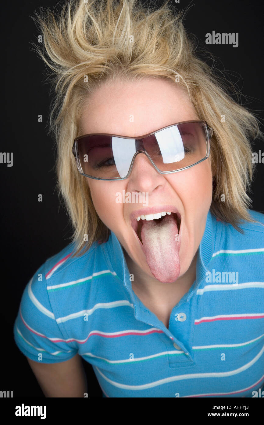 Woman sticking her tongue out Stock Photo: 8275298 - Alamy Woman sticking her tongue out Stock Photo: 8275298 - Alamy