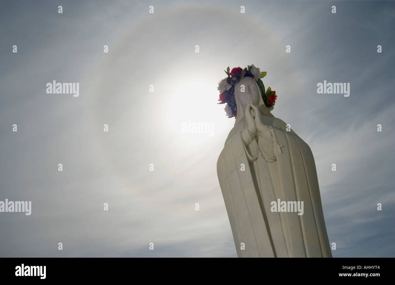 Statue of a woman praying Stock Photo - Alamy
