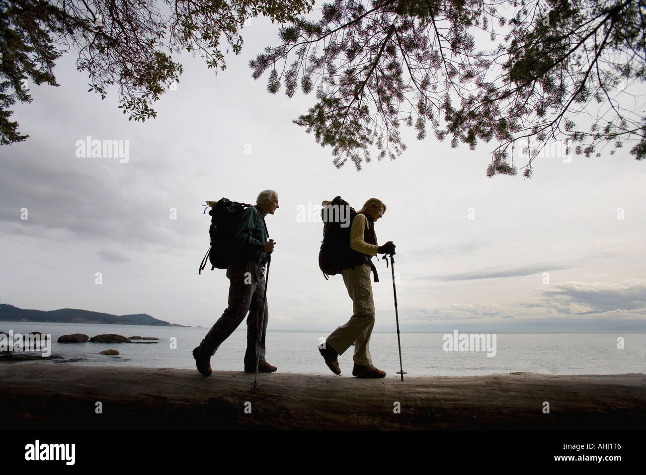 Hiking along a beach Stock Photo - Alamy