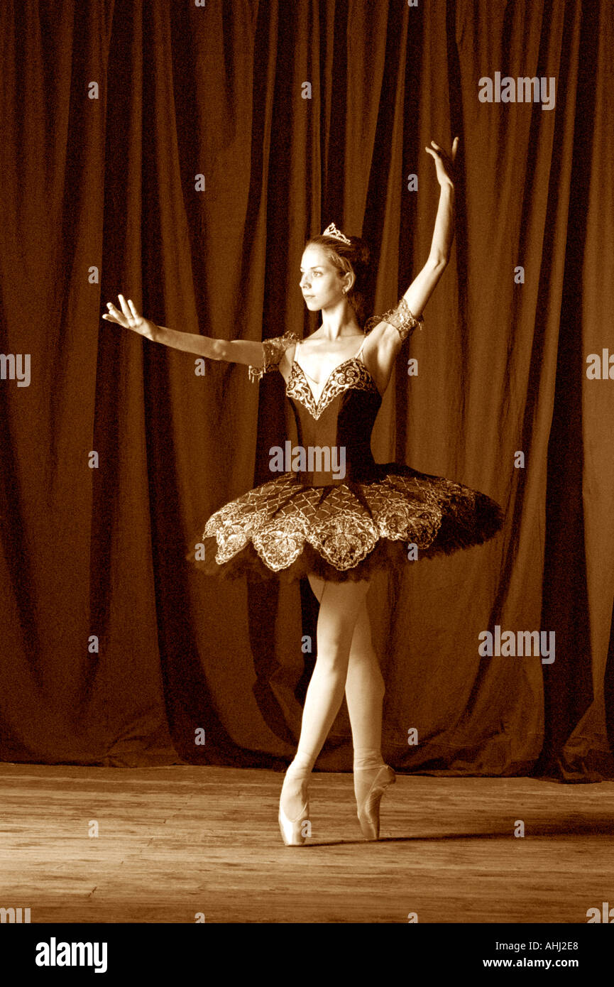 Female ballet dancer standing on her toes in toe shoes ballet dancer ...