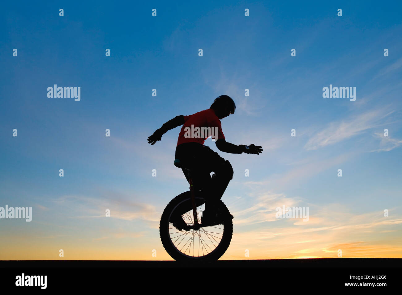 Silhouette unicycle hi-res stock photography and images - Alamy