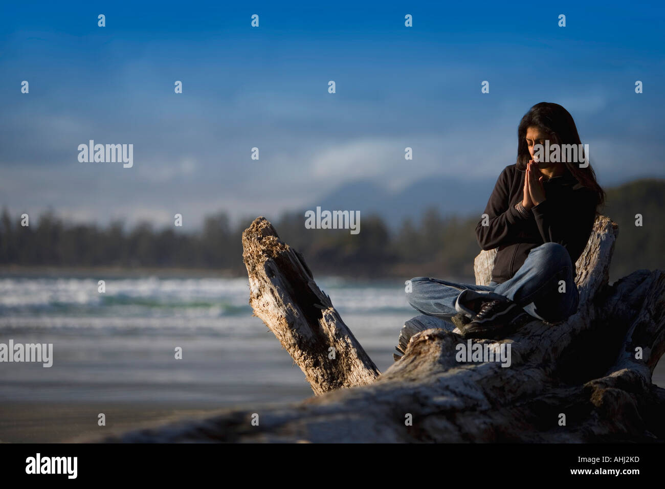 Refuge prayer at the beach Stock Photo - Alamy