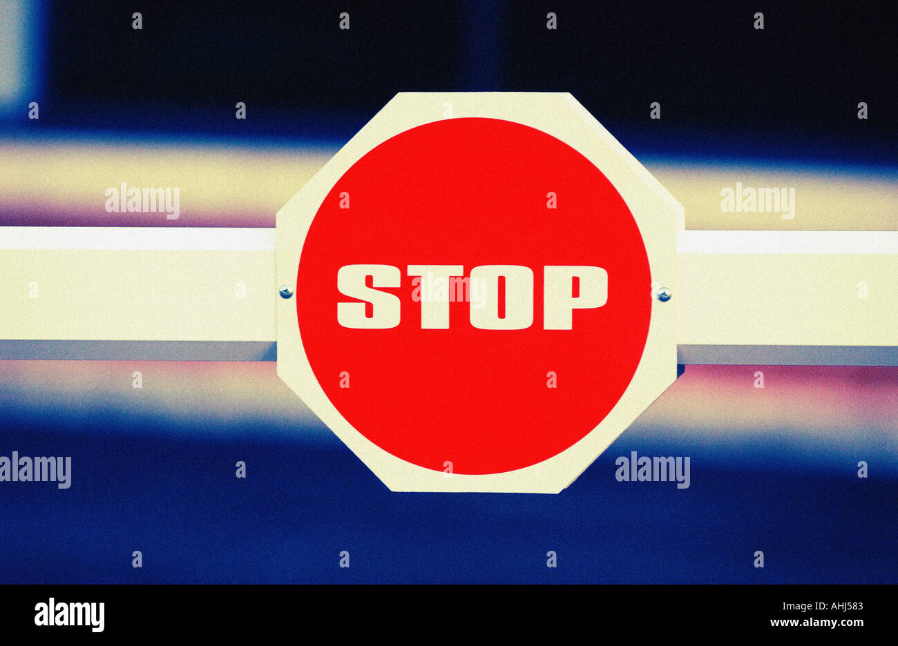 red circular STOP sign on barrier Stock Photo - Alamy