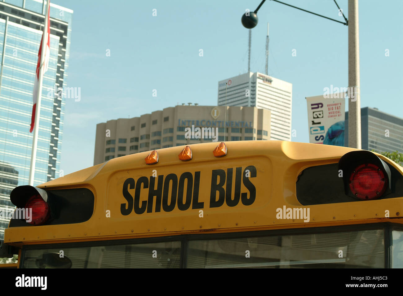 Kids crossing front school bus hi-res stock photography and images - Alamy