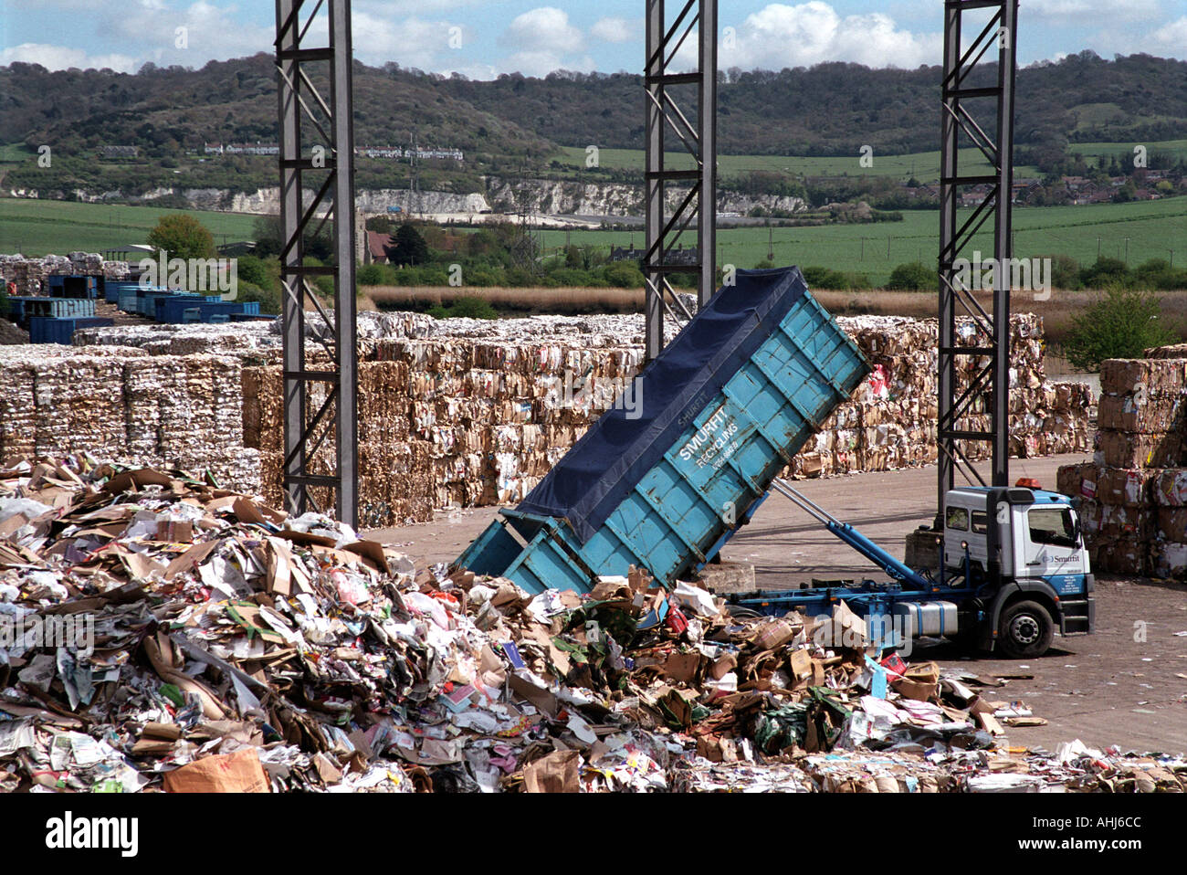 Lorry unloading used card and paper stacks for recycling Smurfit paper ...