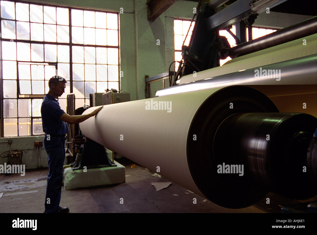 Rolls paper passing through machines hi-res stock photography and ...