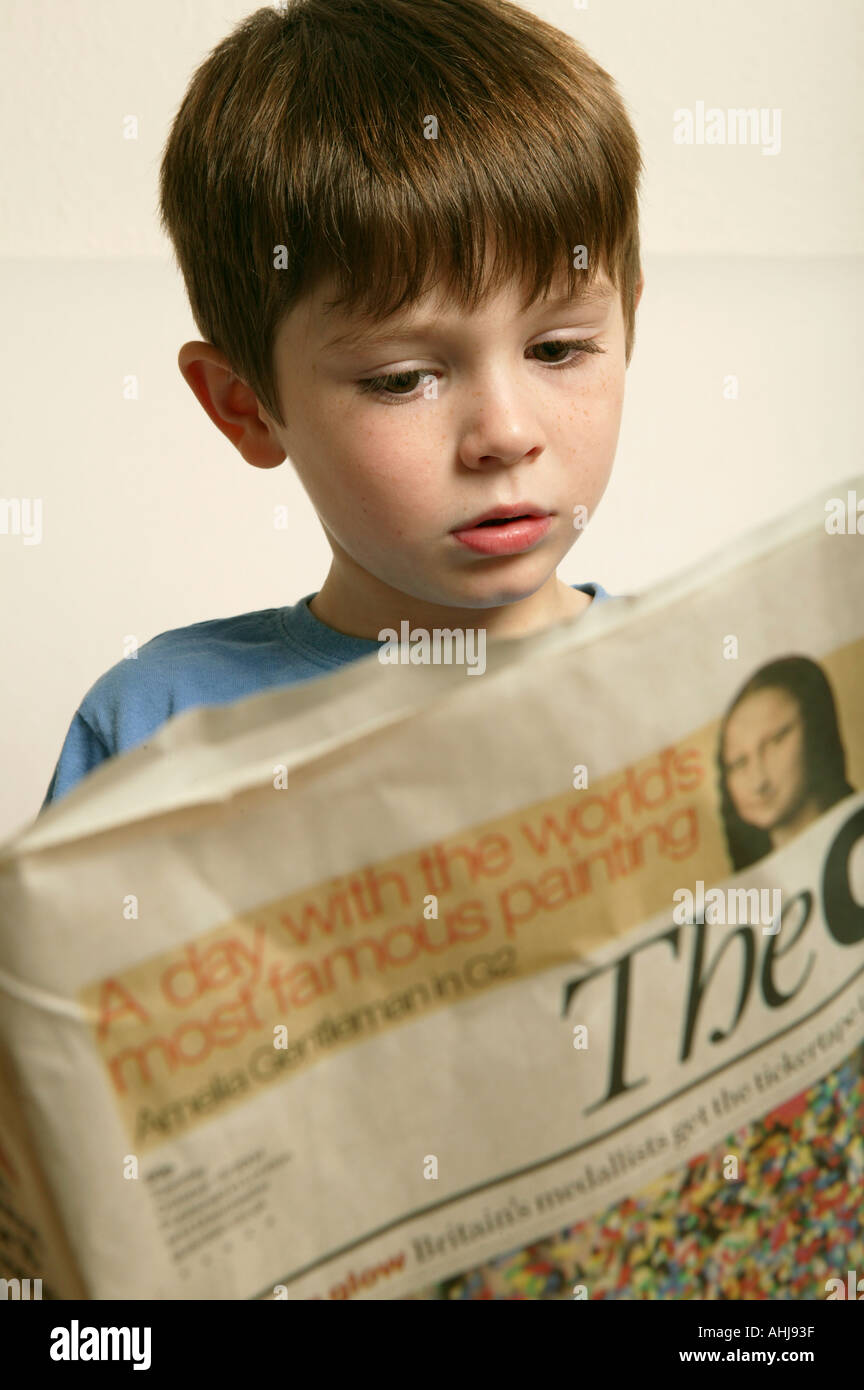 reading a broadsheet broad sheet national british newspaper news paper ...