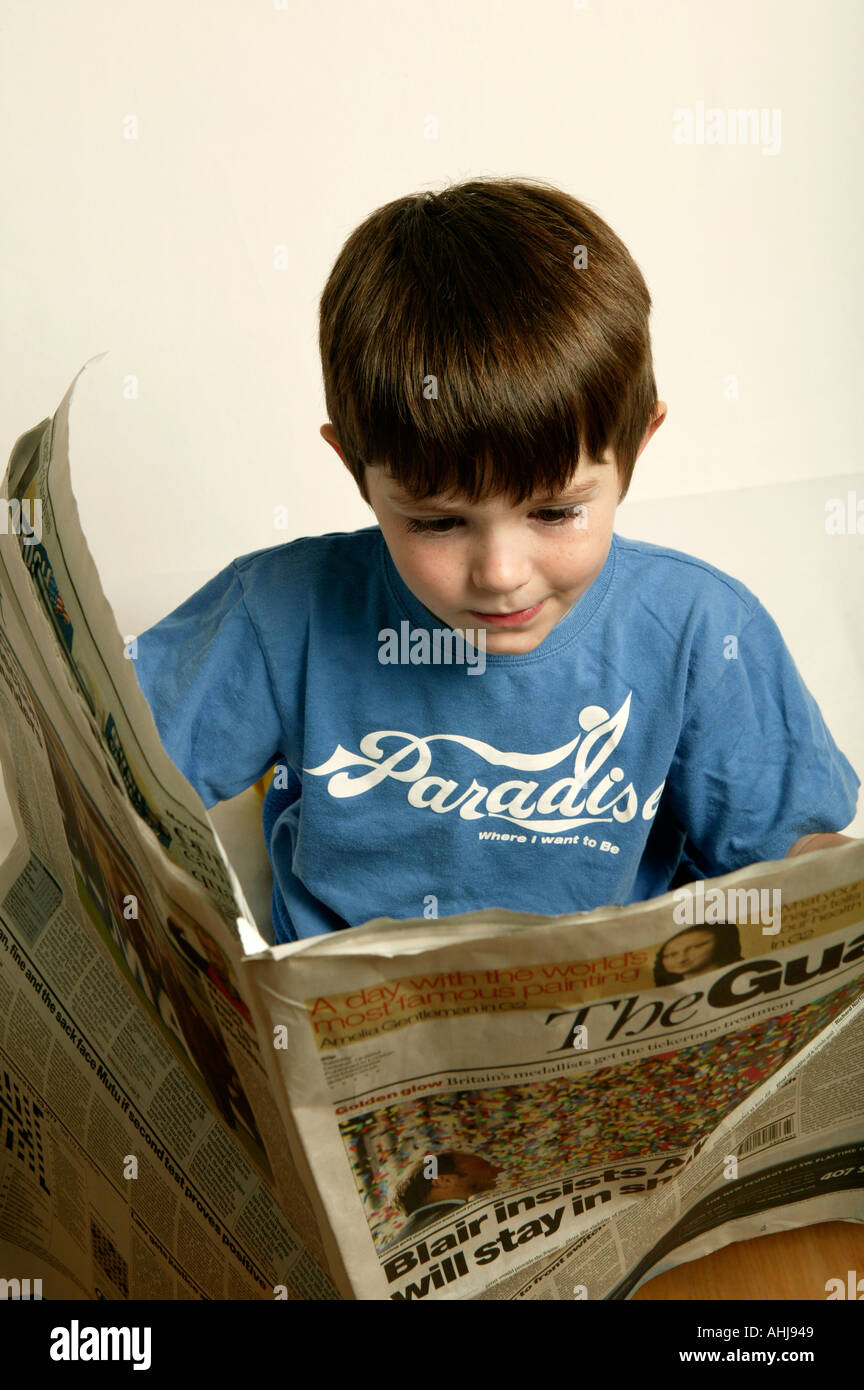 reading a broadsheet broad sheet national british Stock Photo - Alamy