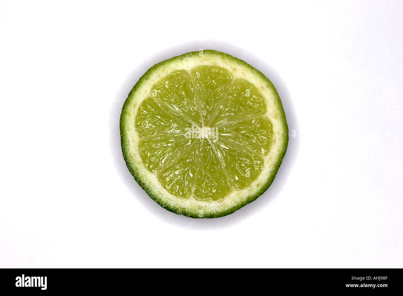 Lime still life sliced isolated on a white background studio still life ...