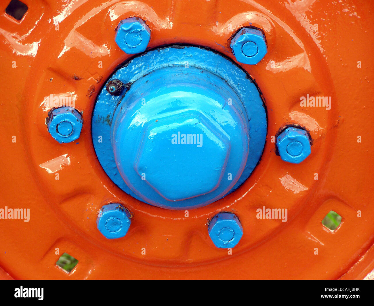 red tractor wheel on blue hub Stock Photo - Alamy