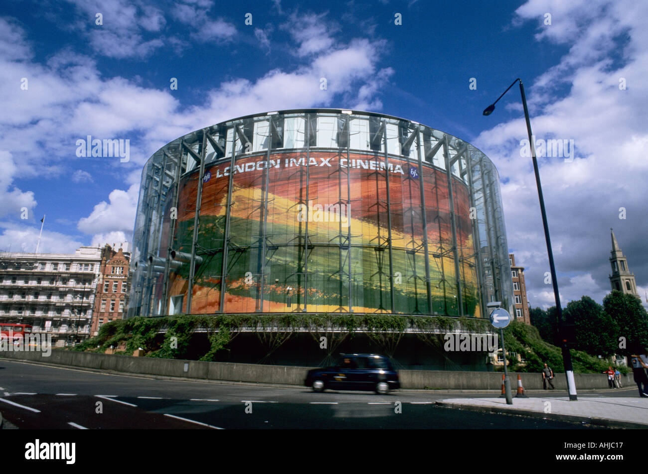 London IMAX Cinema with iconic London black cab in front and blue sky ...