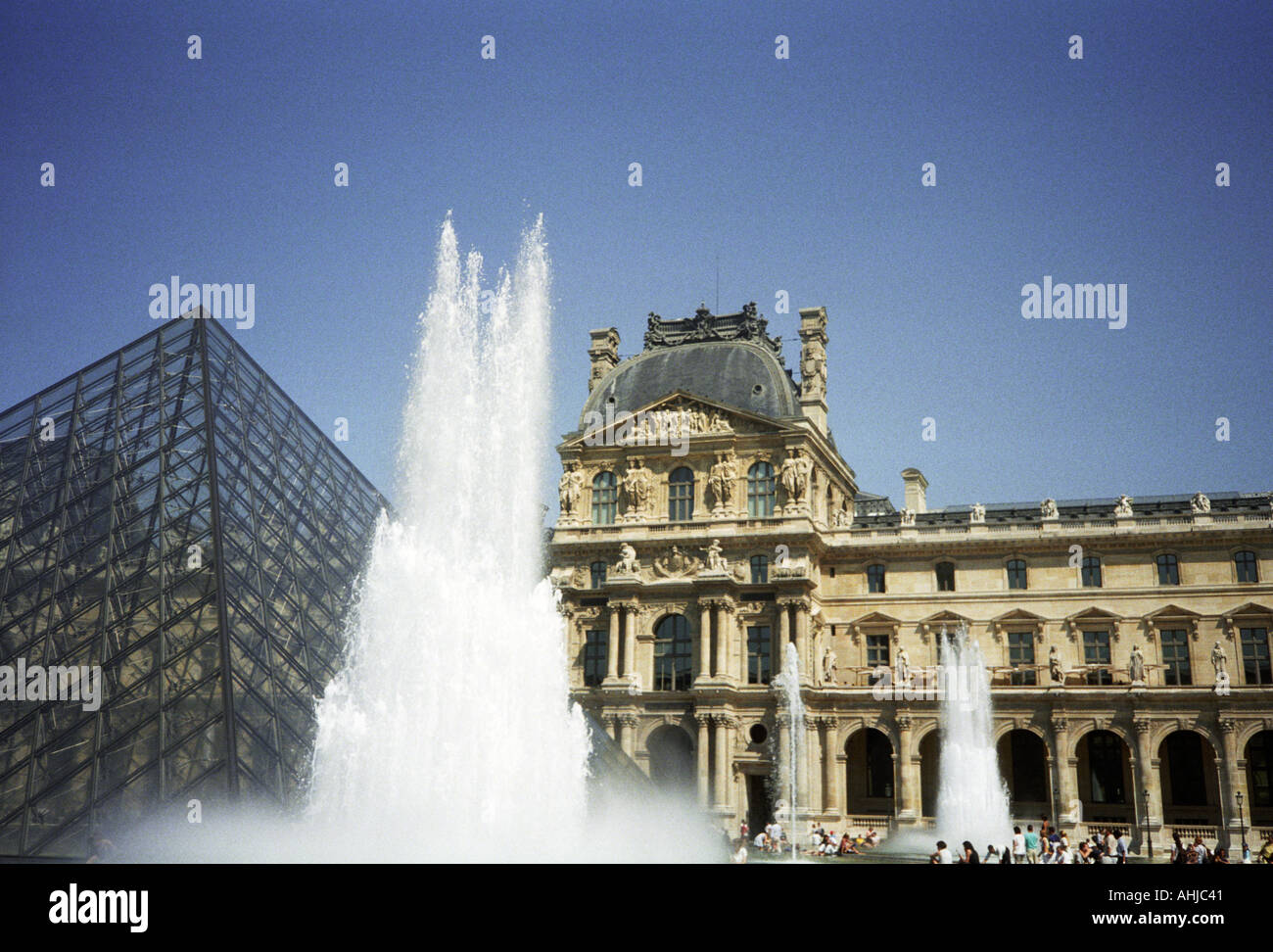 The Louvre museum - the old building in the background, the modern ...