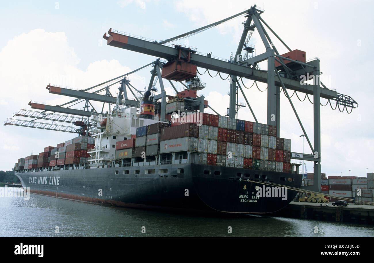 Cargo containers stacked four high on deck of Yang Ming Line ship 'Ming ...