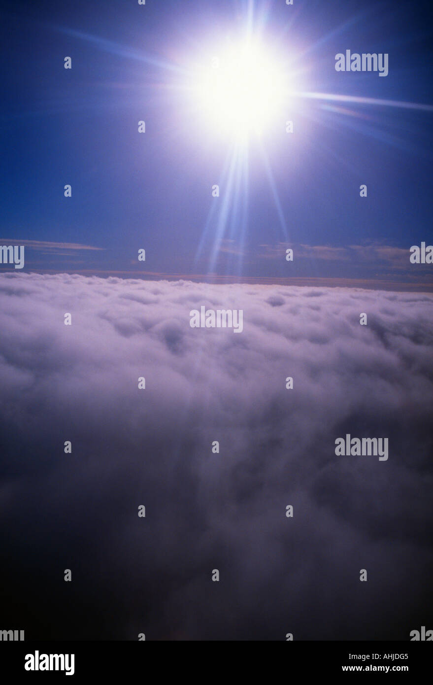Sun shining above the clouds Stock Photo - Alamy