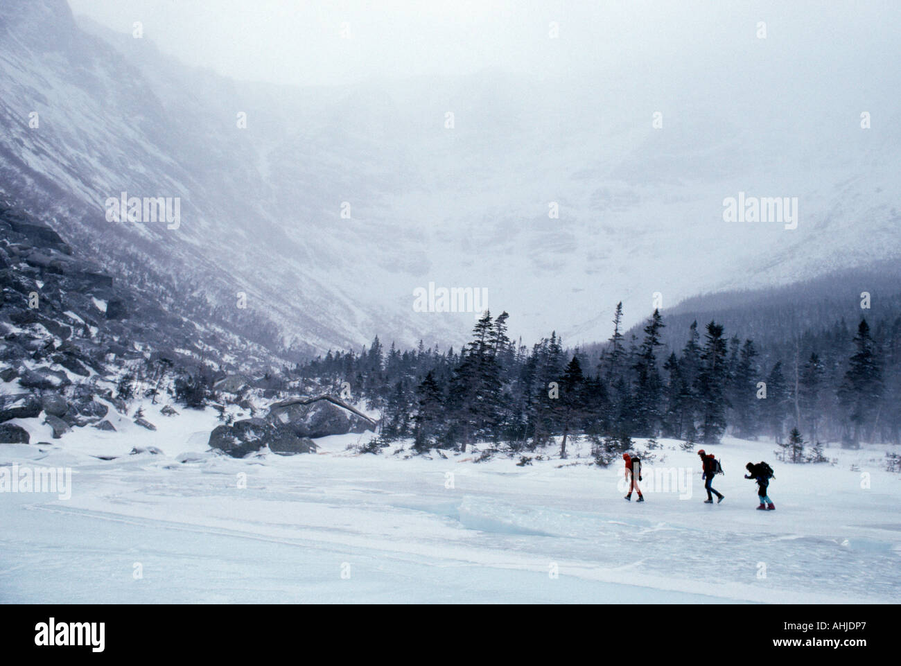 Hikers in a valley Stock Photo - Alamy