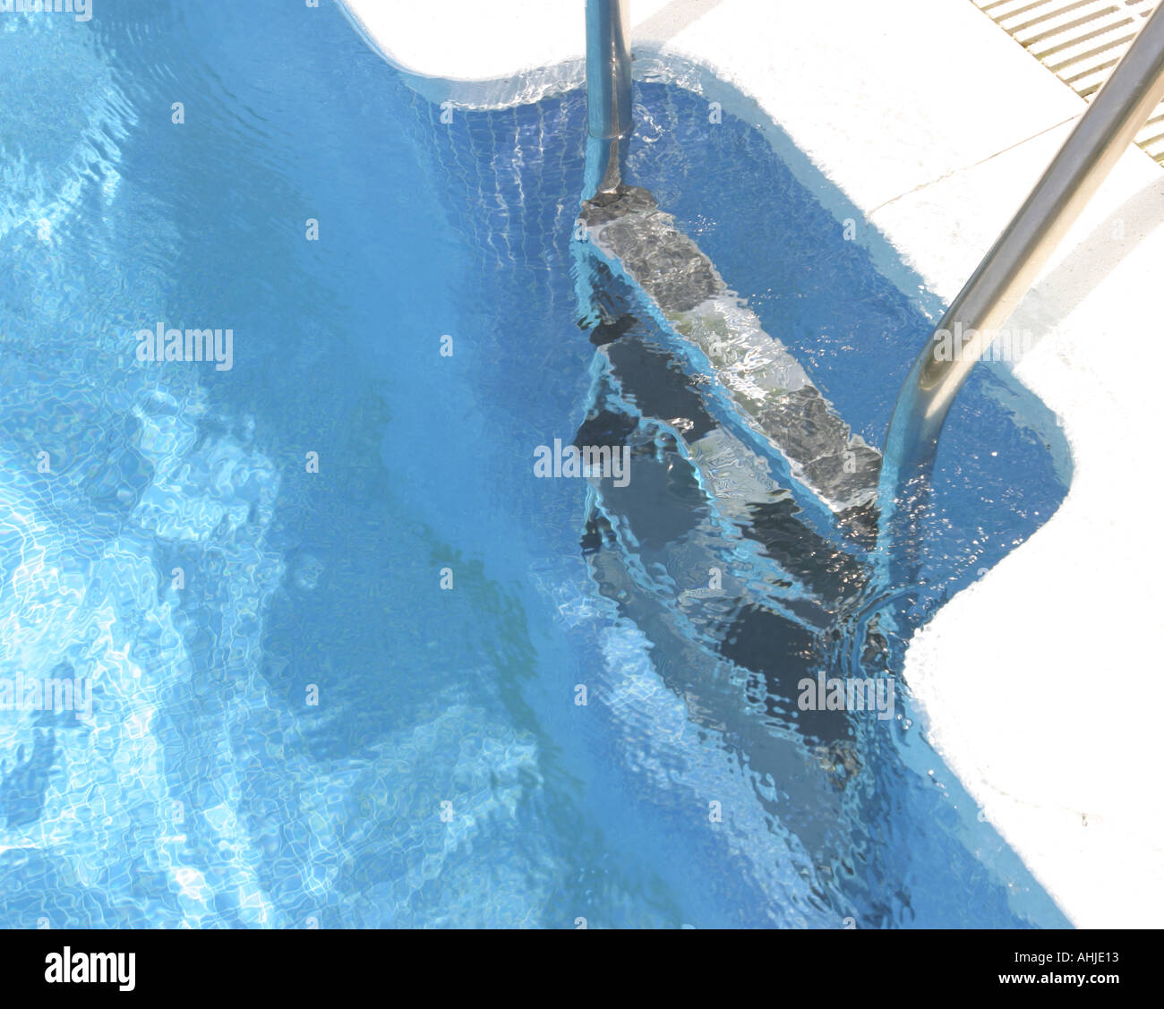Swimming pool ladder Stock Photo - Alamy